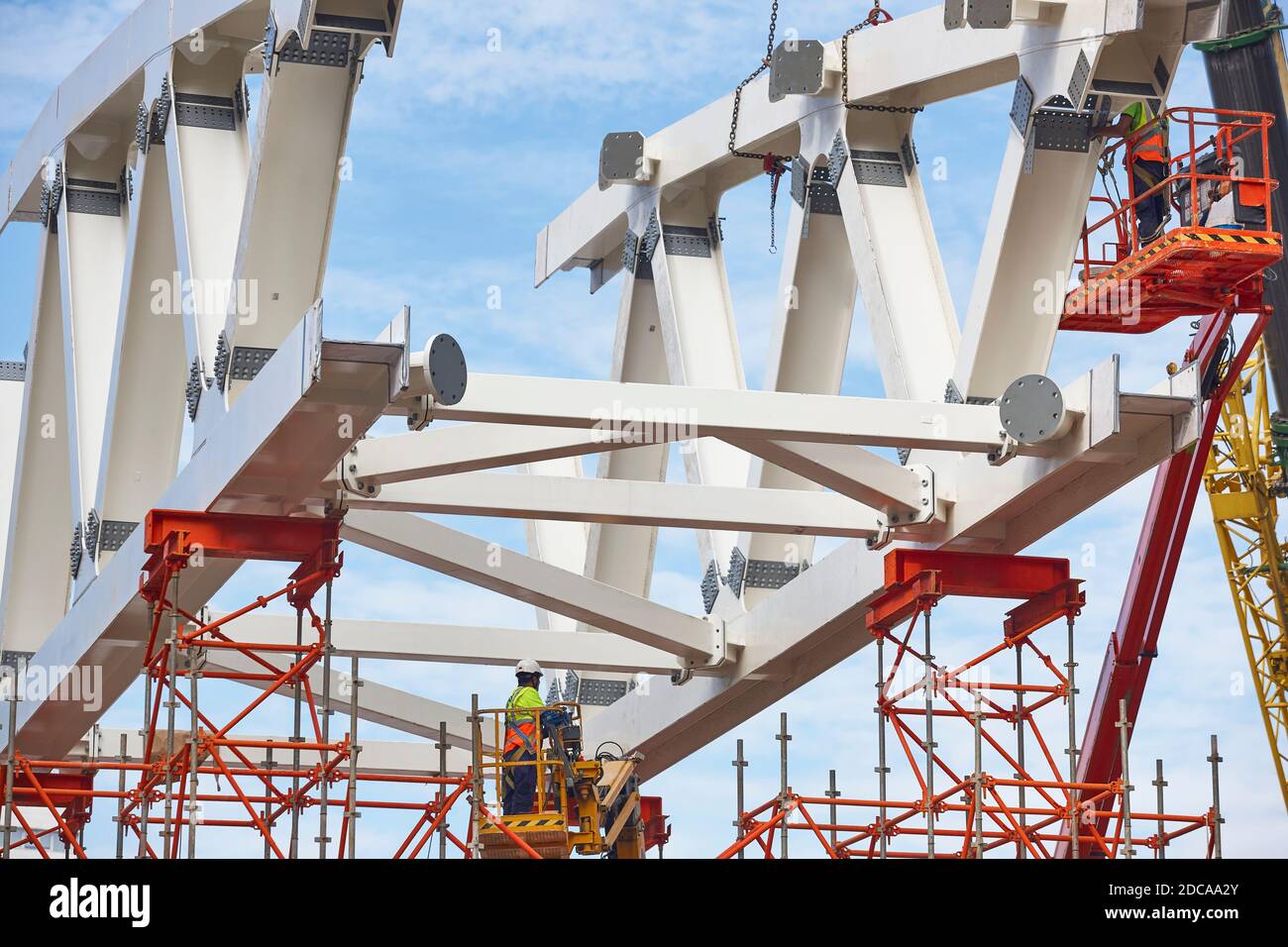 Workers on a construction site. Engineering and architectural ...