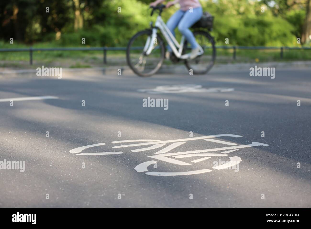 cycle symbols on the street Stock Photo - Alamy