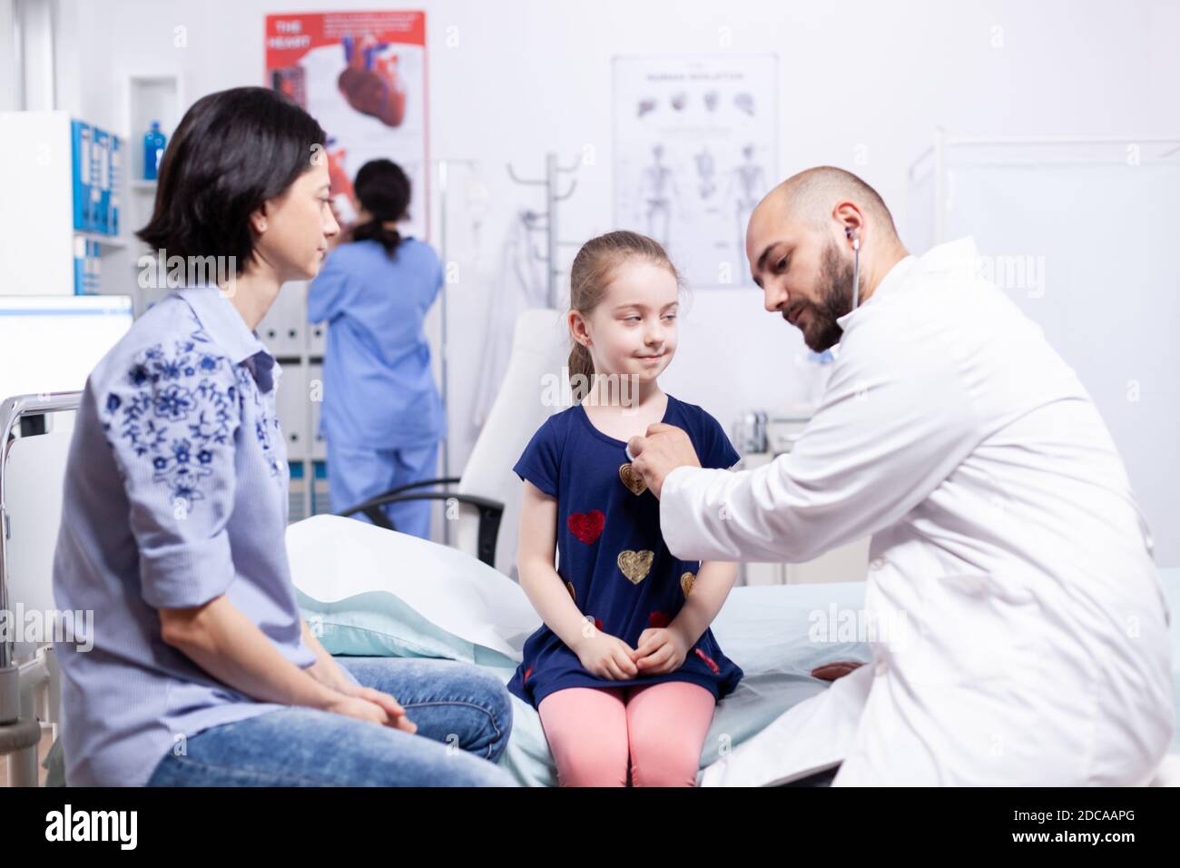 Girl using stethoscope hi-res stock photography and images - Alamy