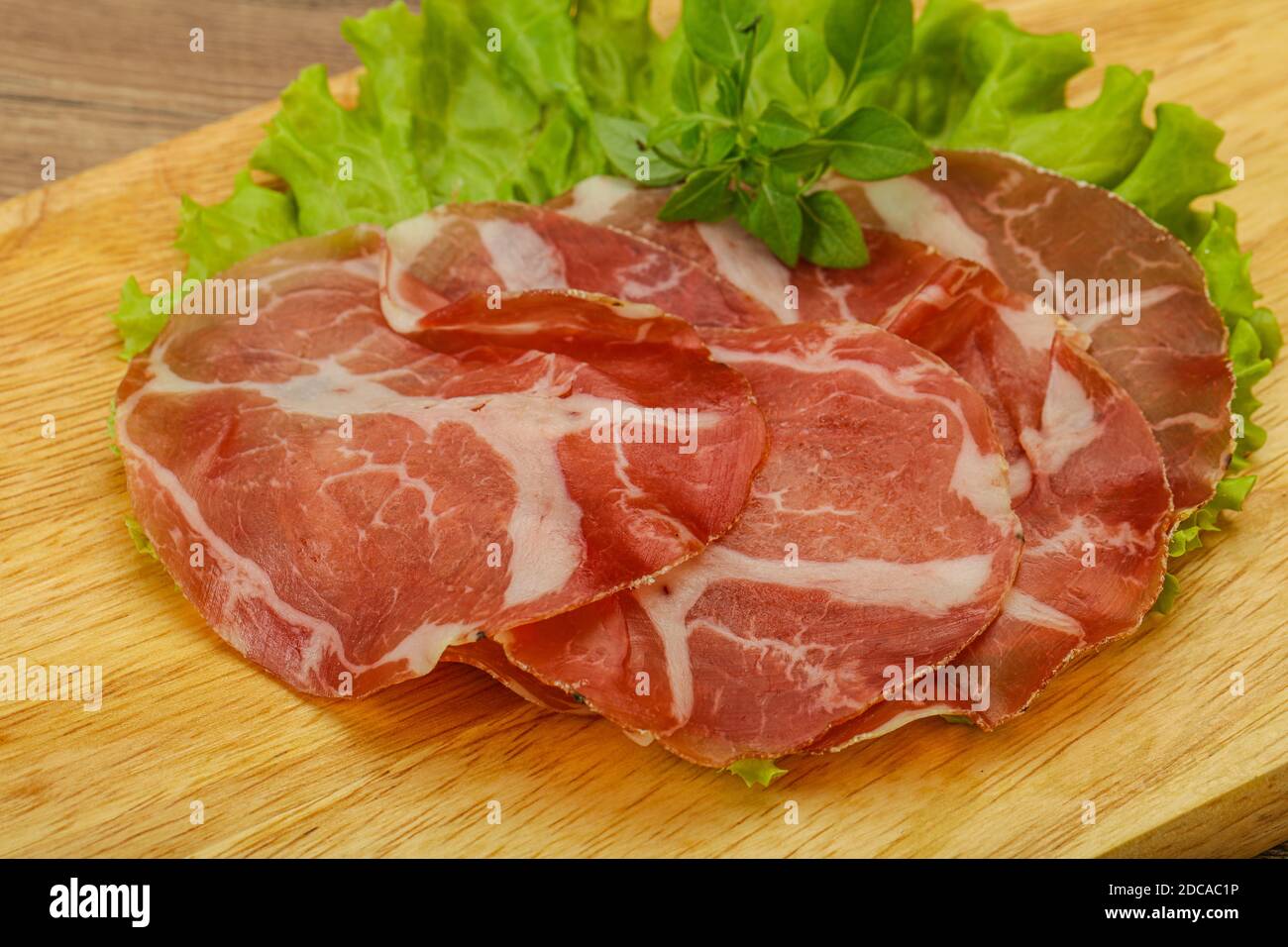 Delicous Smoked pork neck slices snack Stock Photo - Alamy