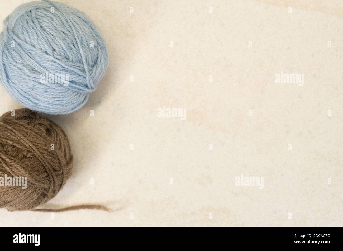 A high angle shot of balls of yarn on a rough surface Stock Photo - Alamy