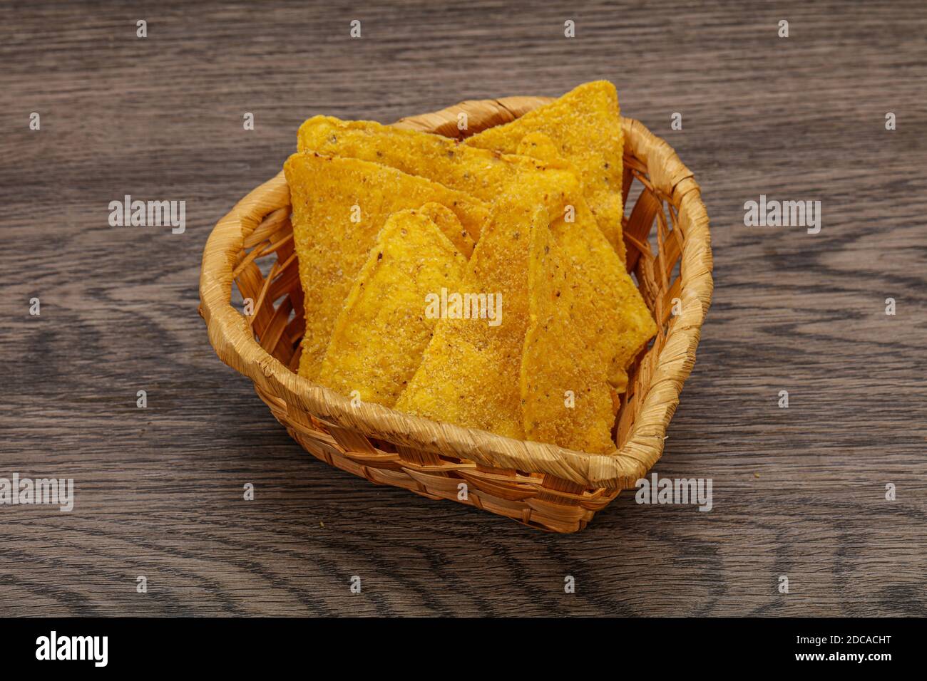 Mexican crunchy corn nachos triangle heap Stock Photo - Alamy
