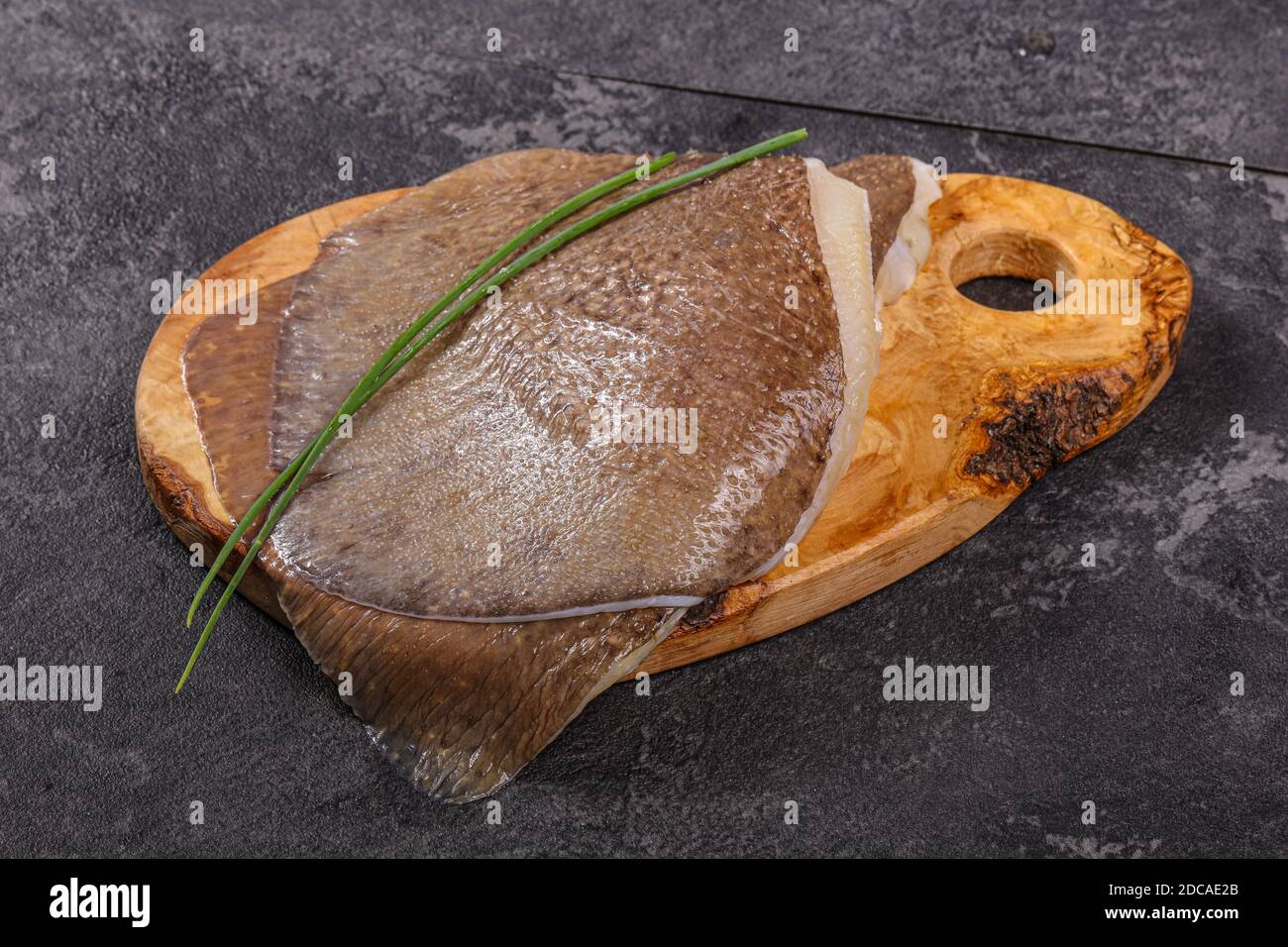 Raw stingray wings tasty fillet for cooking Stock Photo - Alamy