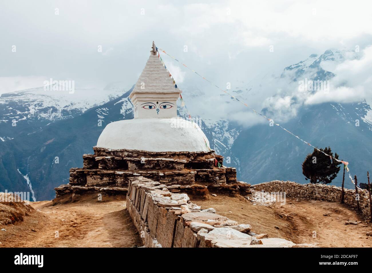 Beautiful traditional white stone Stupa with Budda eyes in Himalayas ...