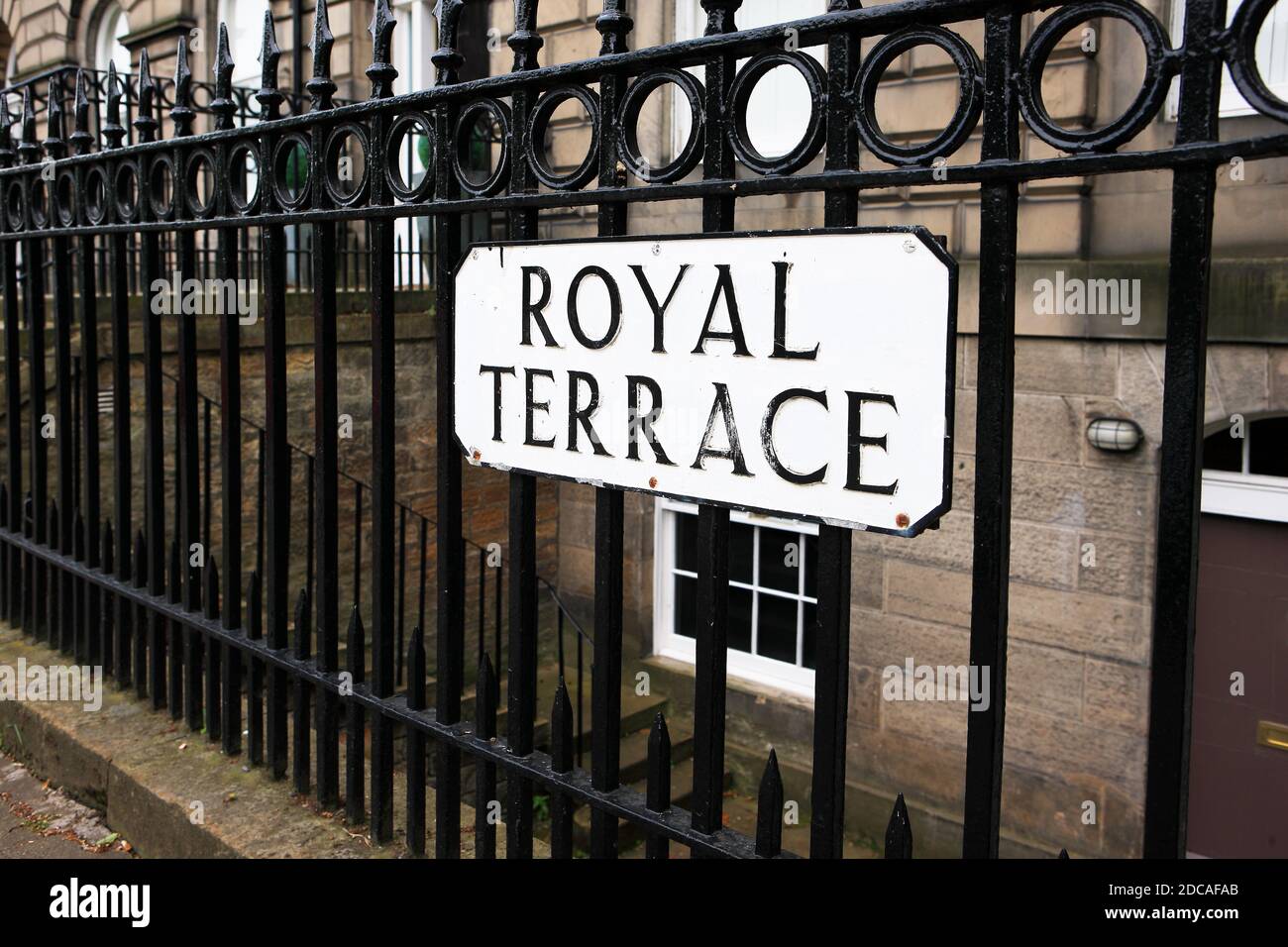 Royal Terrace, Edinburgh street name sign attached to railings Stock ...