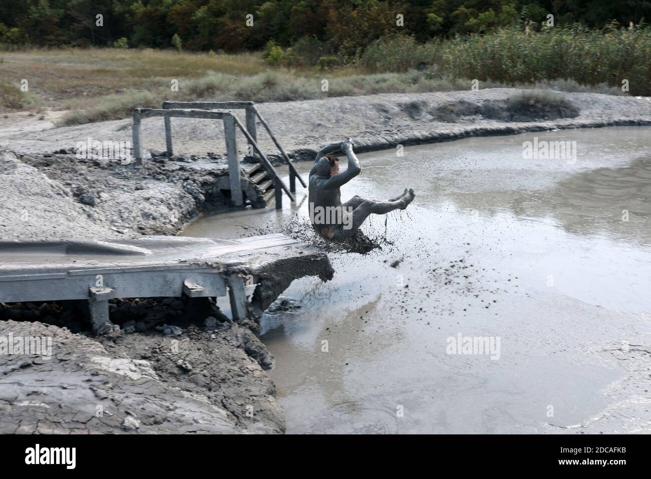 Man bathing mud hi-res stock photography and images - Alamy