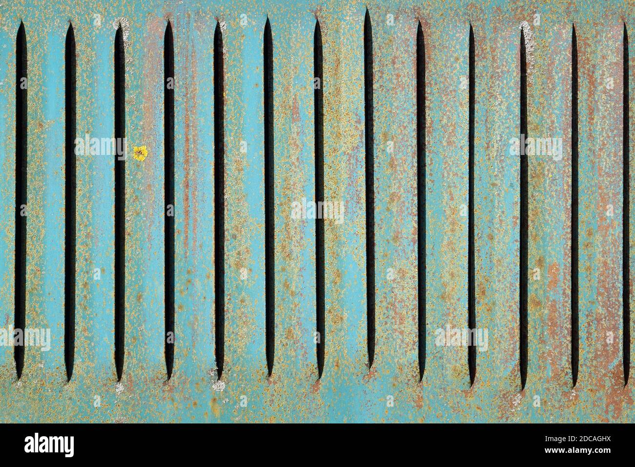Vertical vents in the body of an old rusty tractor background Stock ...