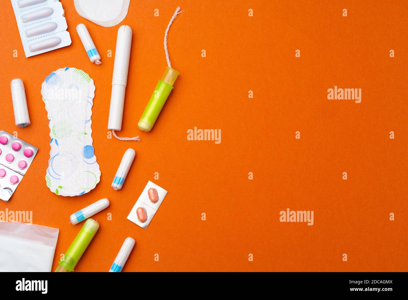 Flat lay of Pads, tampons and pills Stock Photo - Alamy