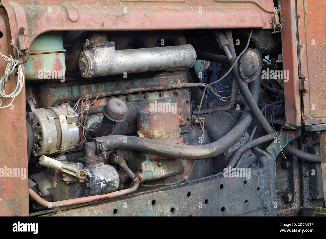Dirty oiled diesel engine from an old vintage tractor Stock Photo - Alamy