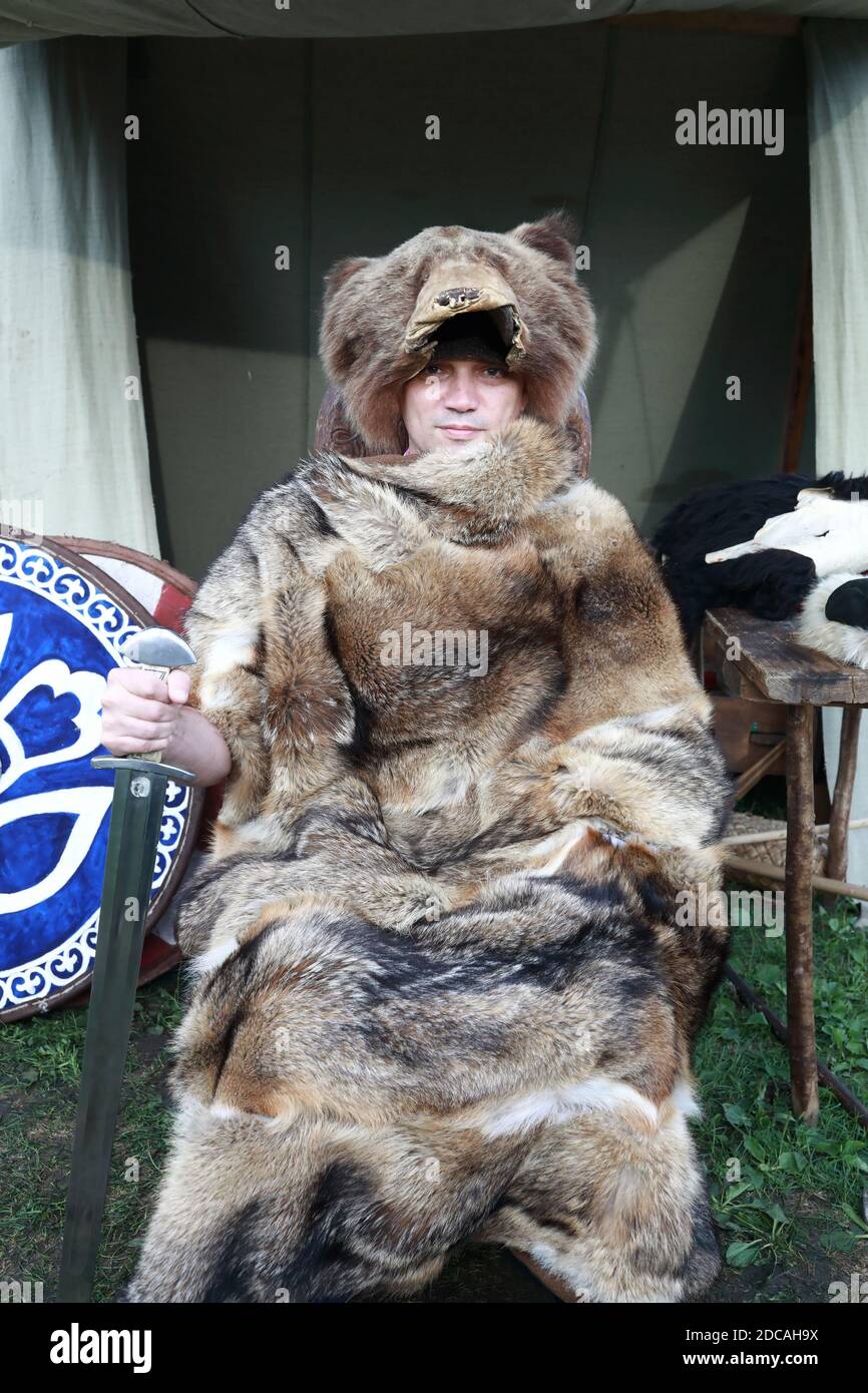 Portrait of man in furs with sword Stock Photo - Alamy