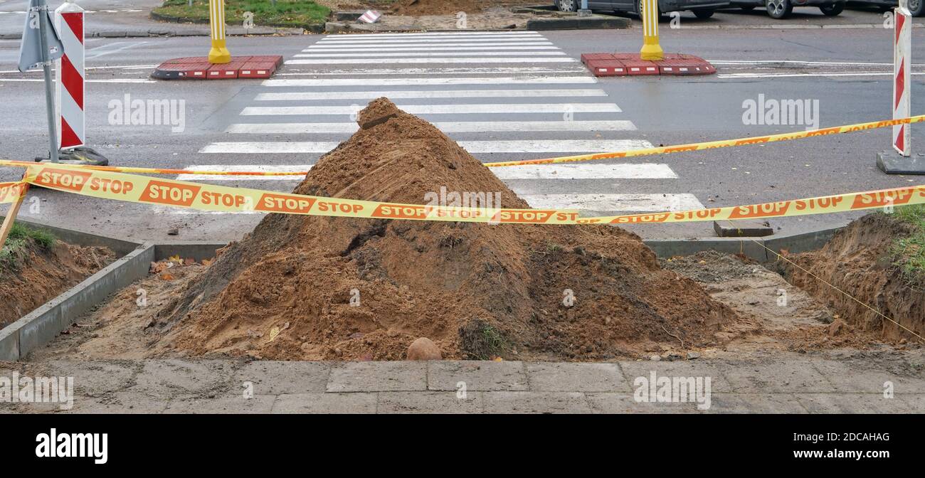 Stop tape limit the area of repair and renovation of a street ...