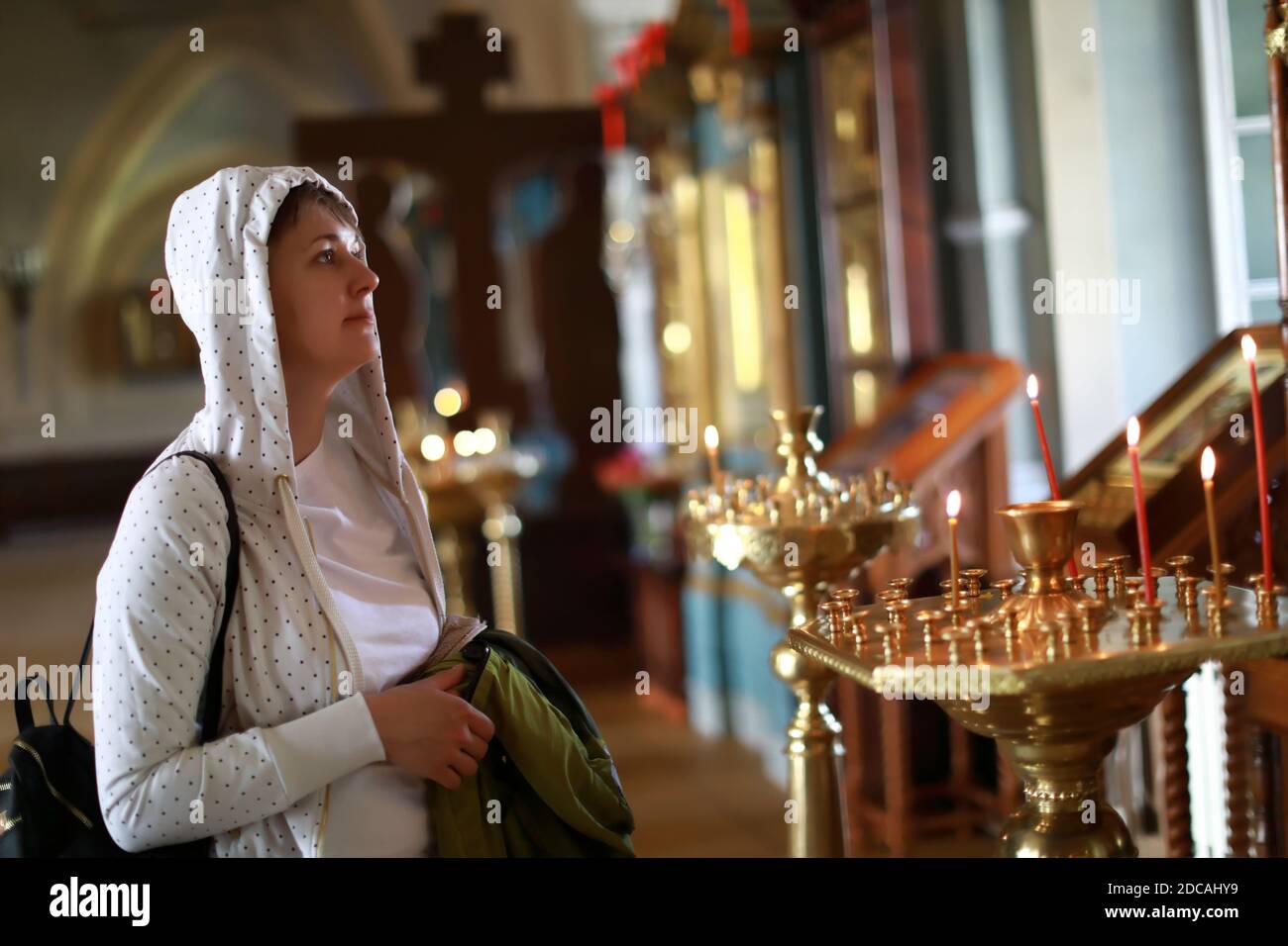 Woman praying in russian orthodox hi-res stock photography and images ...