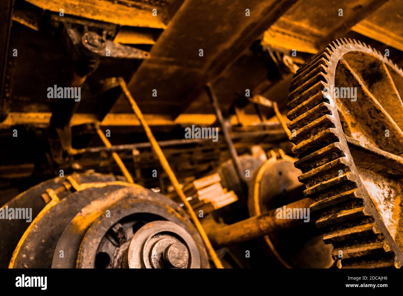 Corroded cog wheels are seen in an engine room of an old gold dredge ...