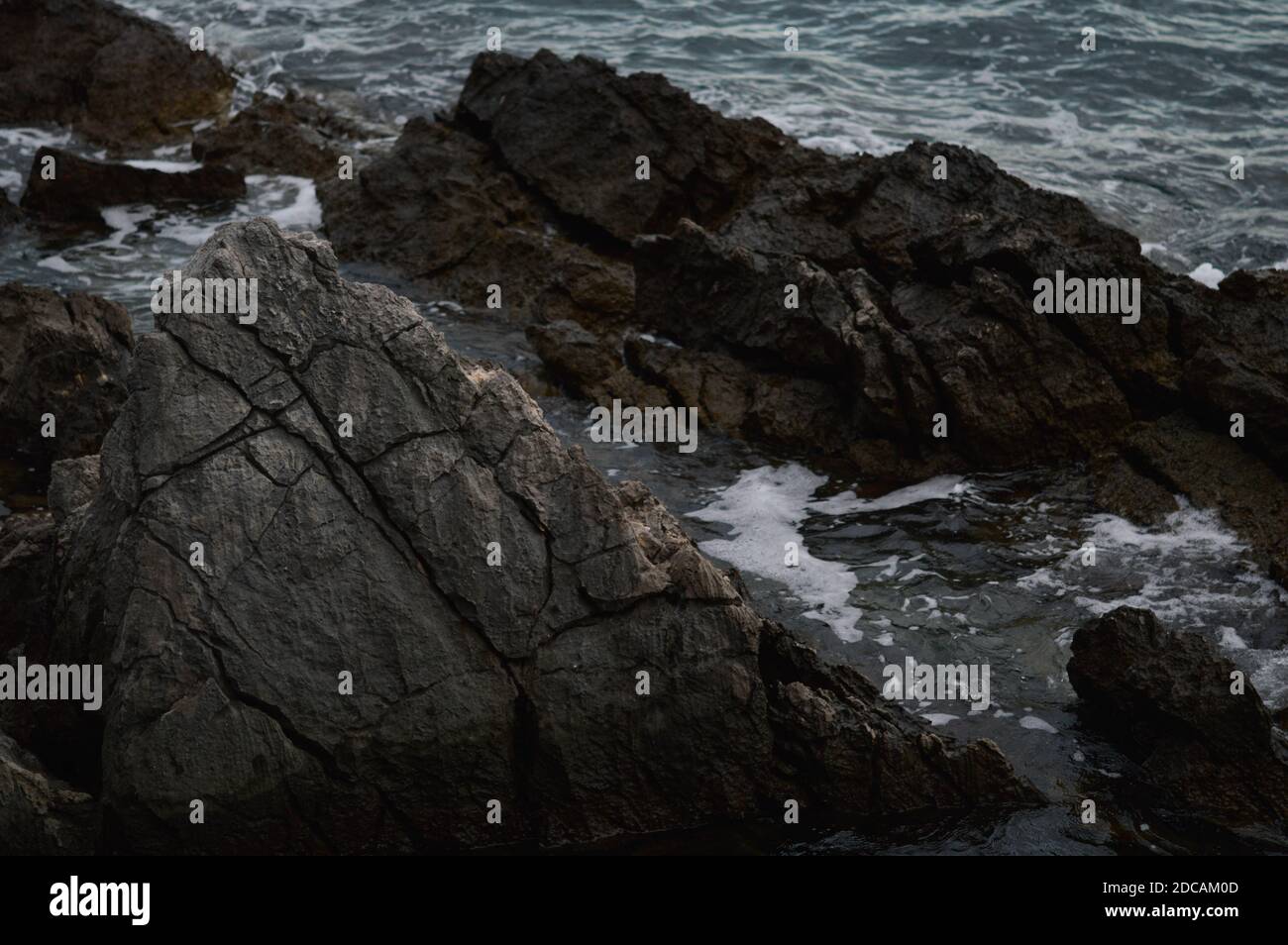 Sea waves crashing into rocks.Sea waves crashing into rocks. Storm at ...