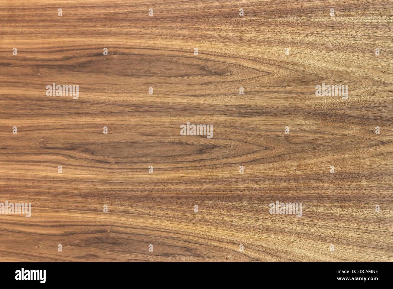 Natural varnished wood texture background. Top view of a walnut wood ...