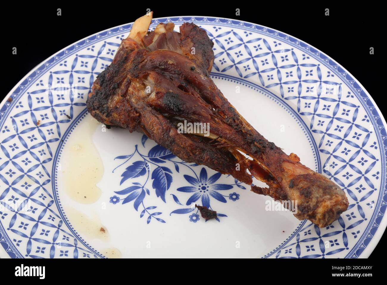 lamb leg roasted ready to eat Stock Photo - Alamy