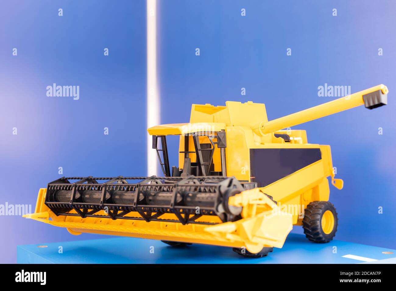 Small agricultural harvester side view Stock Photo - Alamy
