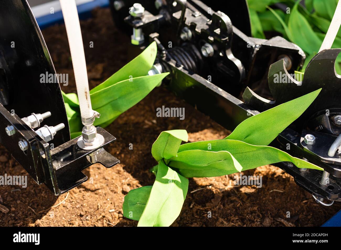 tractor and seeder planting crops on a field, planting machine parts ...