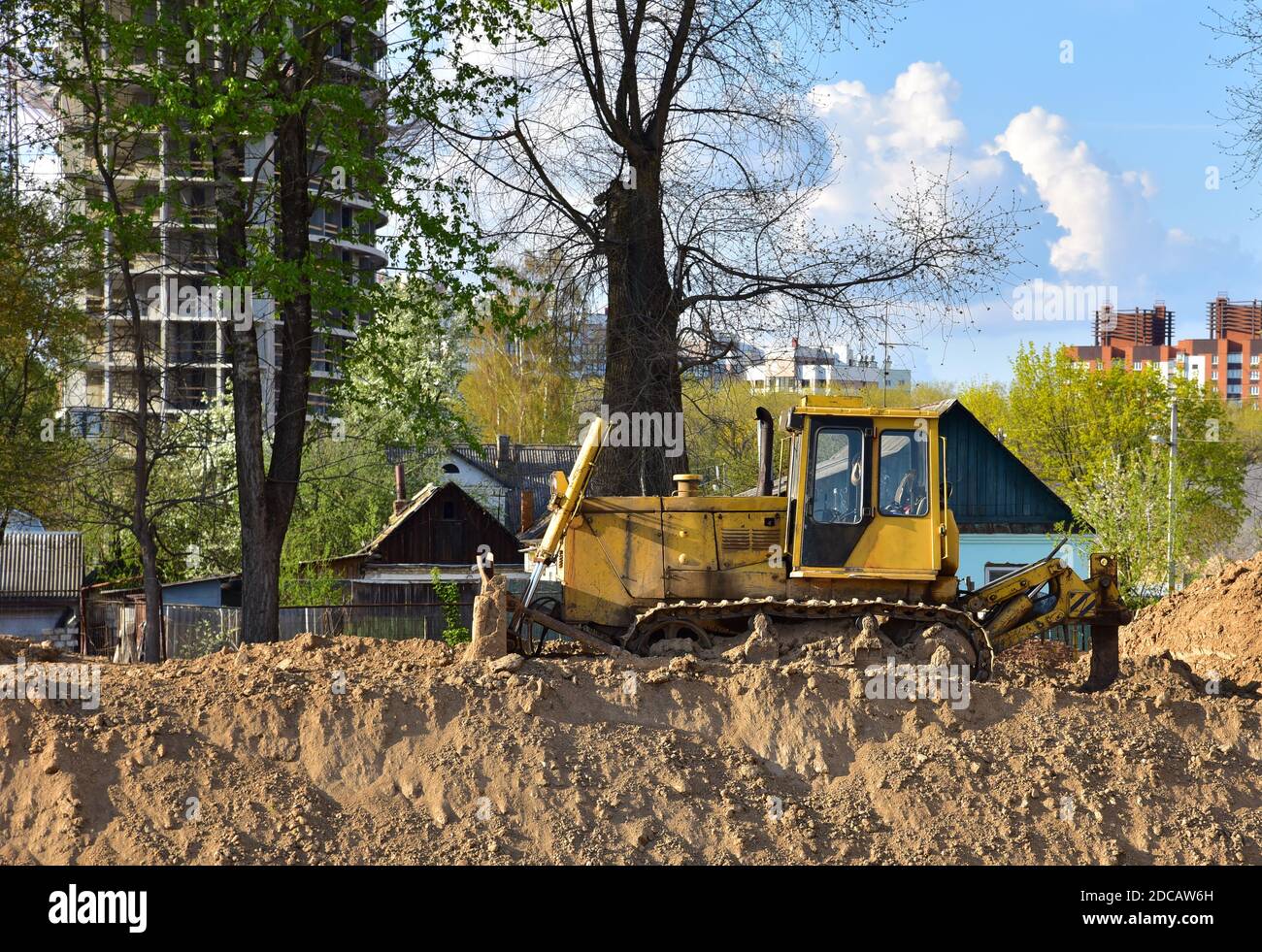 Dozer working at construction site. Bulldozer for land clearing ...