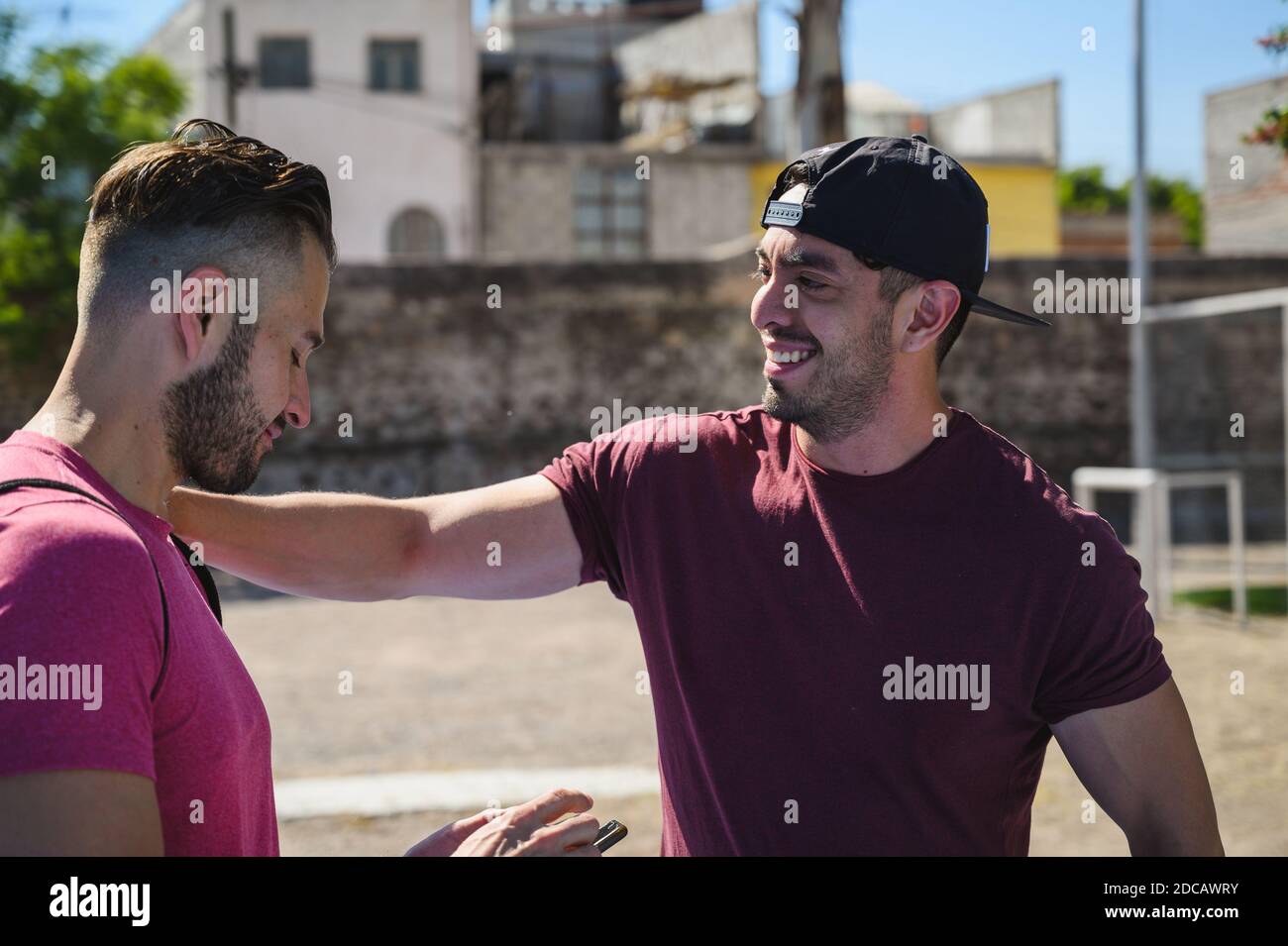 Patting shoulder hi-res stock photography and images - Alamy