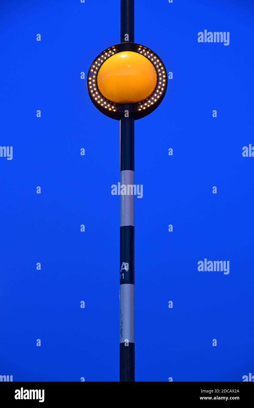 belisha beacon flashing at zebra crossing at dusk united kingdom Stock ...