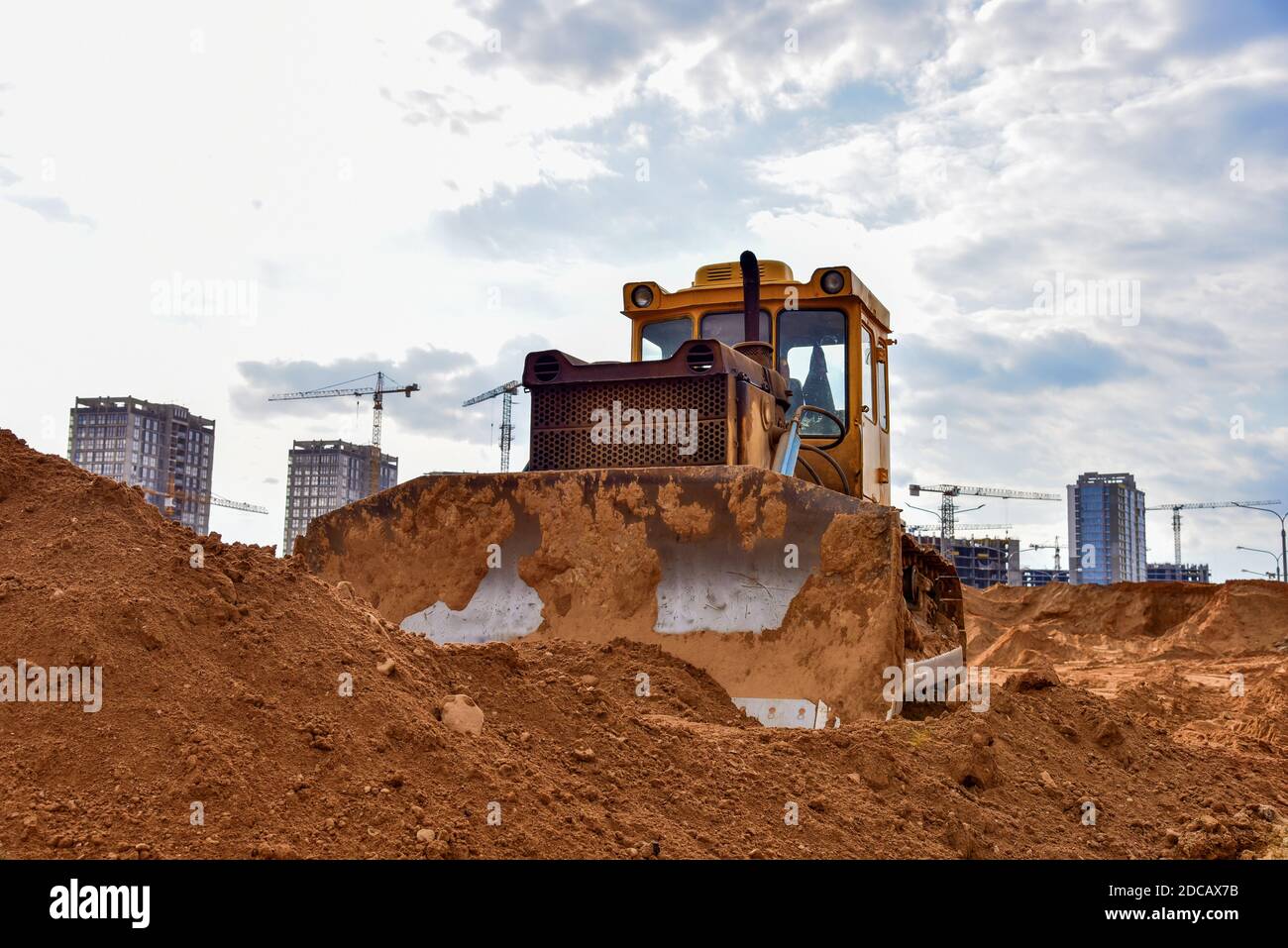 Track-type dozer during of large construction jobs at building site ...