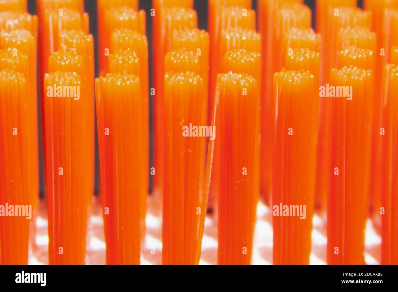 Brush teeth orange hi-res stock photography and images - Alamy