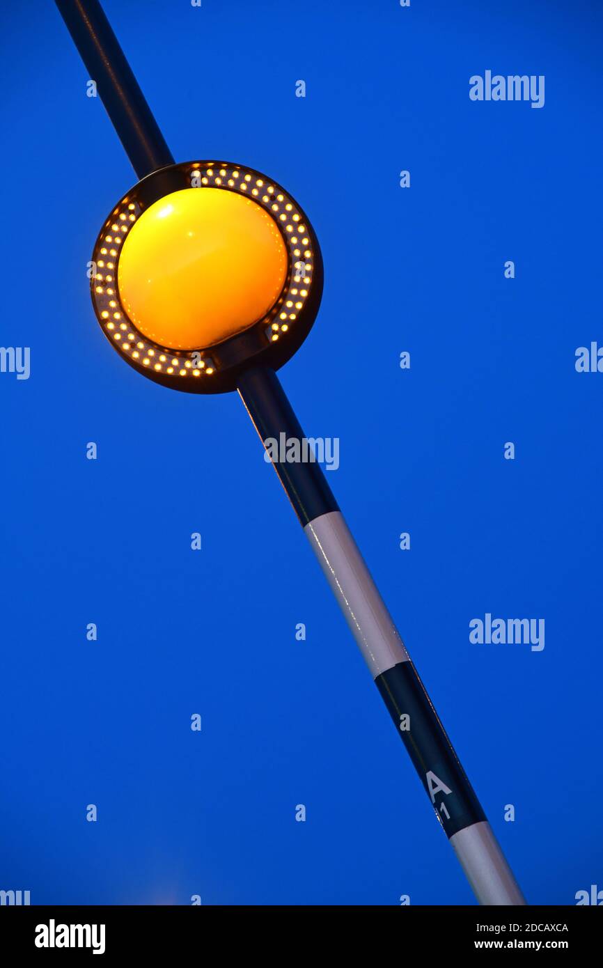 belisha beacon flashing at zebra crossing at dusk united kingdom Stock ...