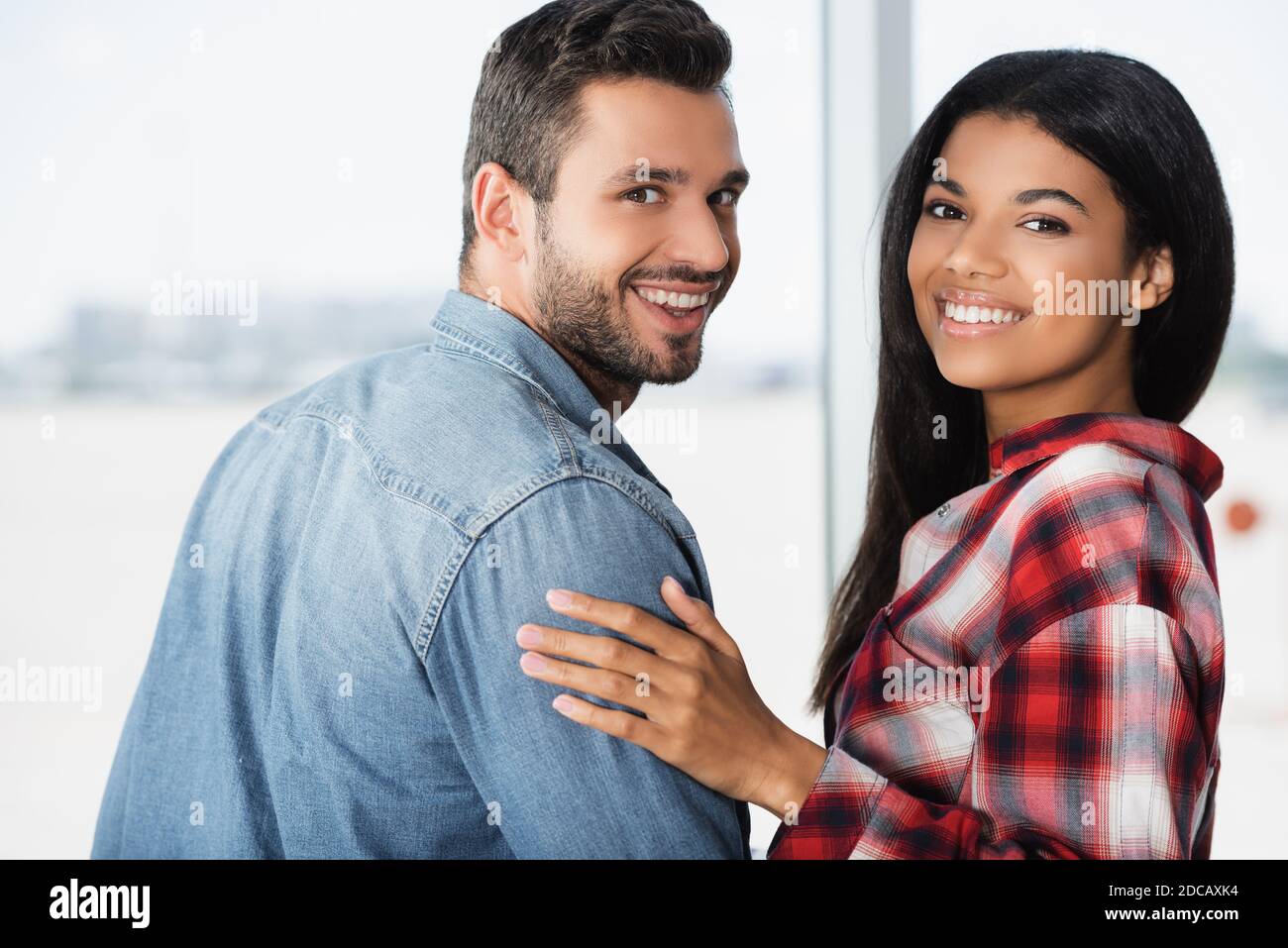 Joyful attractive multicultural couple hi-res stock photography and ...