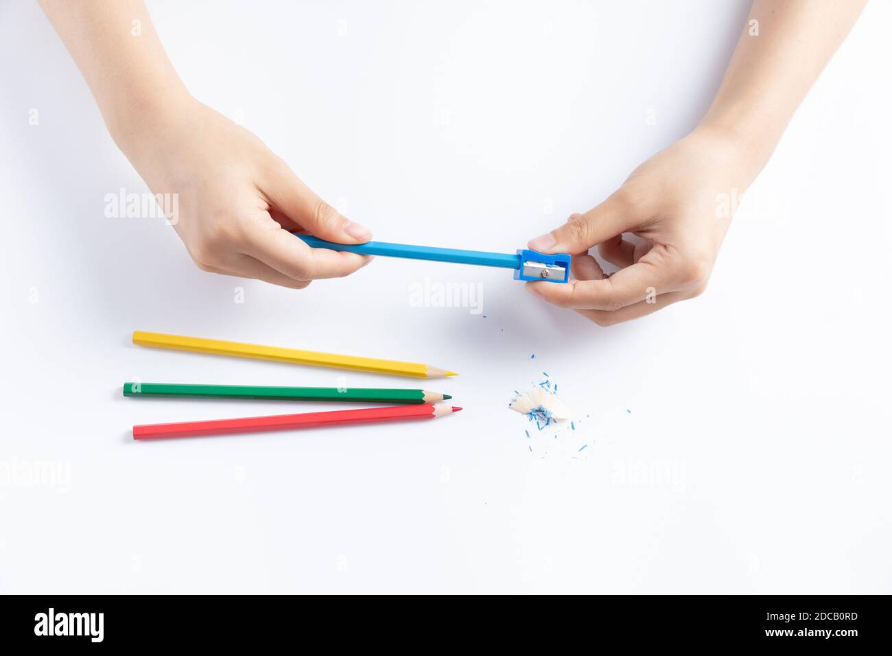A closeup shot of a hand sharpen a pencil Stock Photo - Alamy