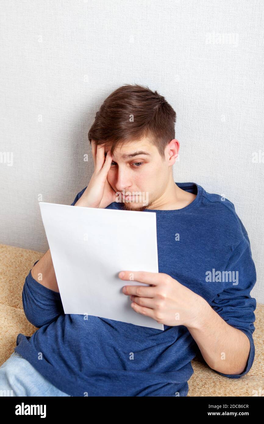 Young man read list hi-res stock photography and images - Alamy