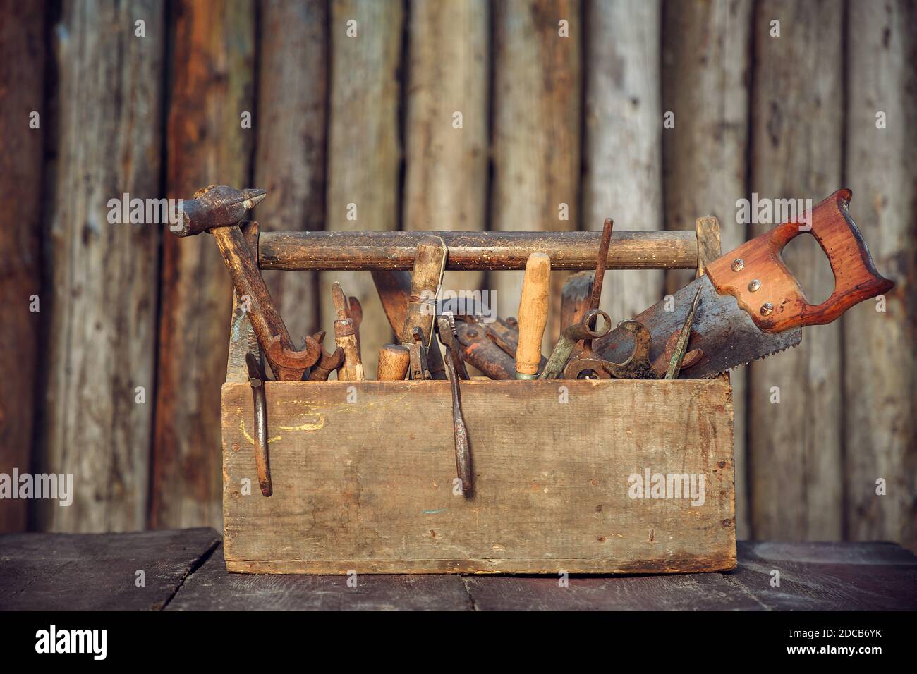 vintage tool box stand on table on timber background Stock Photo - Alamy