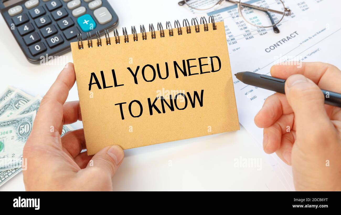 Notebook with the text - All you need to know - on the office table among the stationery Stock ...