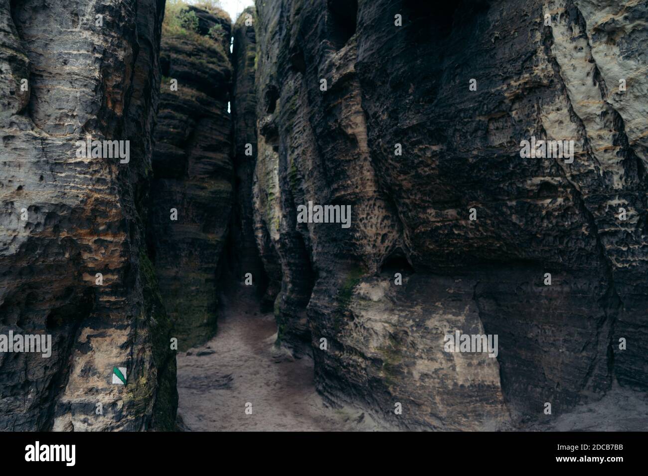 Rock sandstone with signs for use in the field. A sign that lines a ...