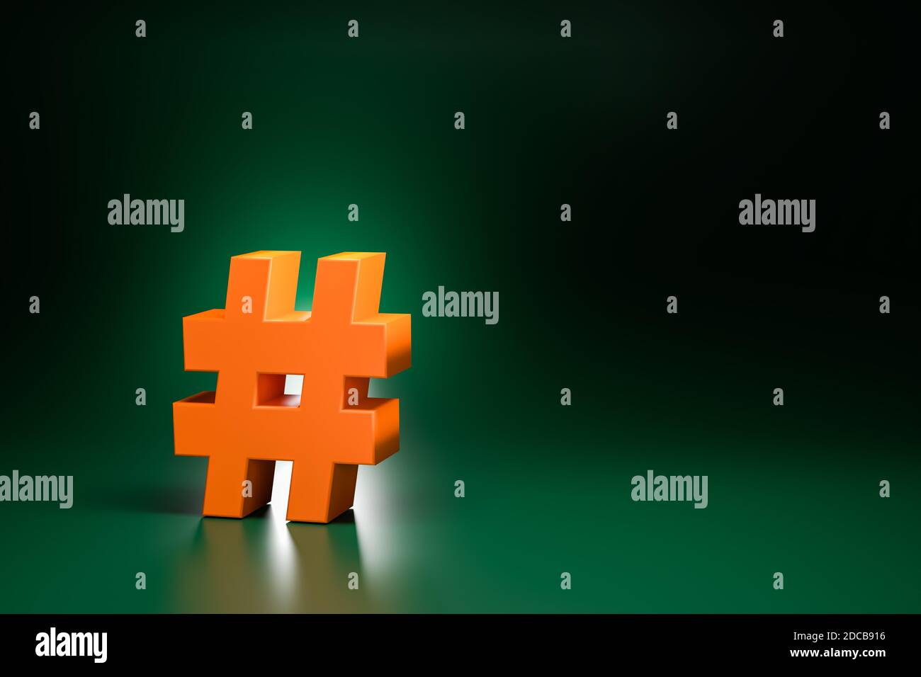 Social Media Concept: An orange colored backlit hashtag on a green ...