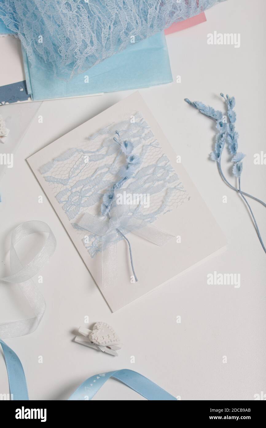 Making greeting cards. Handicraft accessories on the white surface of ...