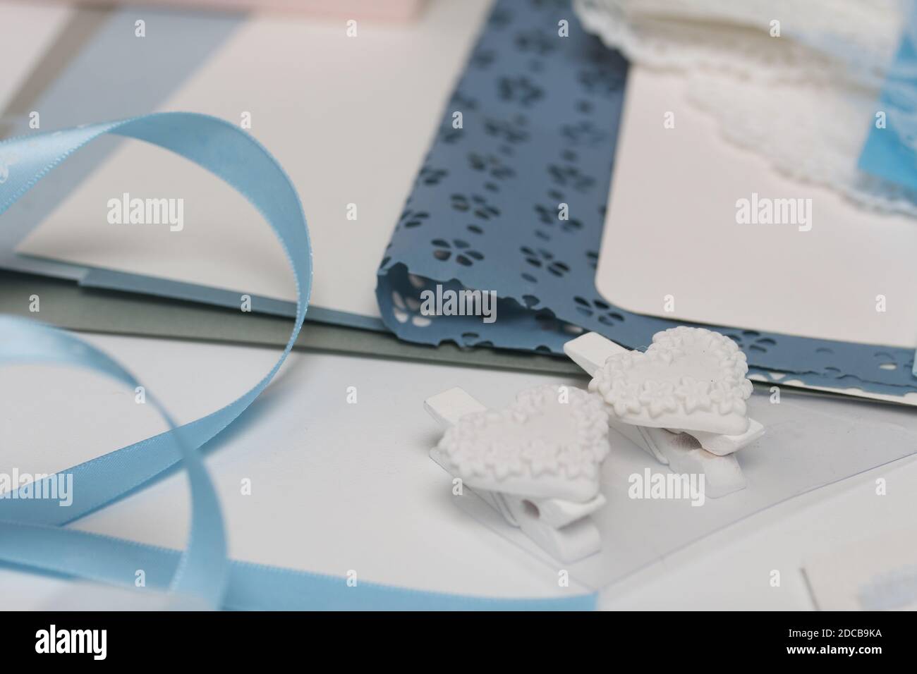 Making greeting cards. Handicraft accessories on the white surface of ...