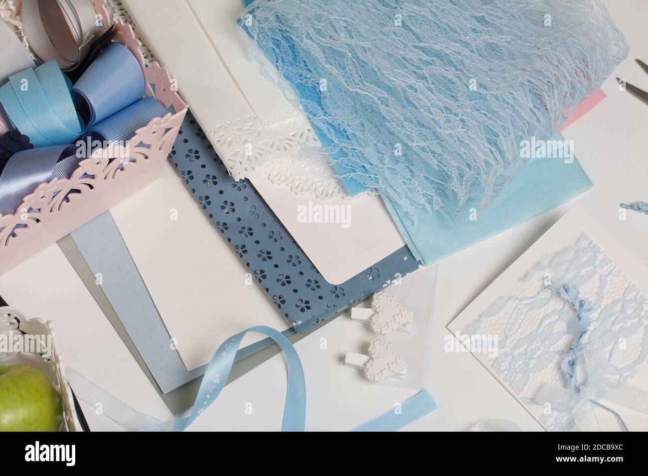 Making greeting cards. Handicraft accessories on the white surface of ...