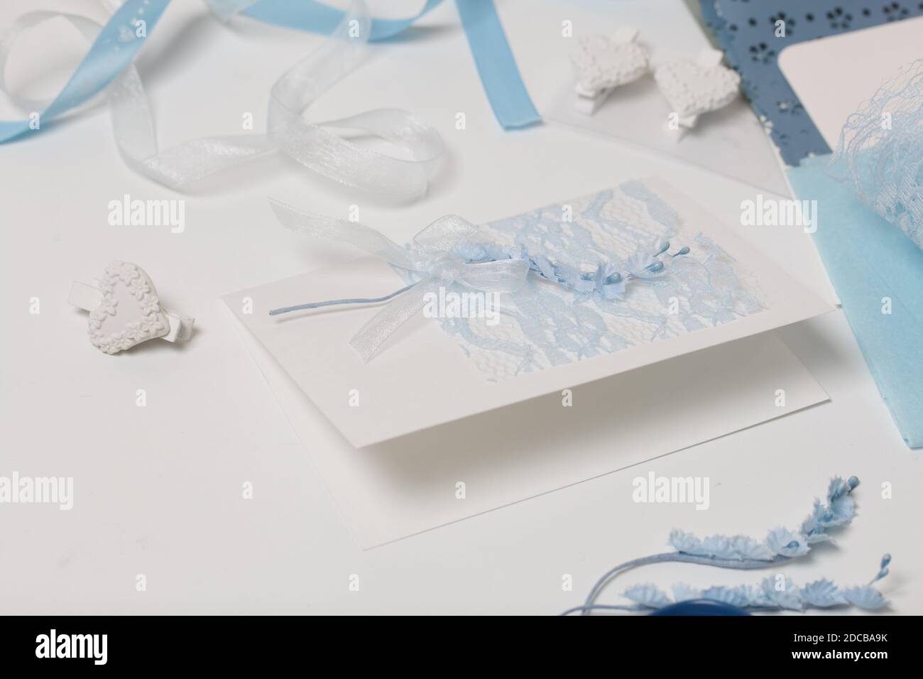 Making greeting cards. Handicraft accessories on the white surface of ...
