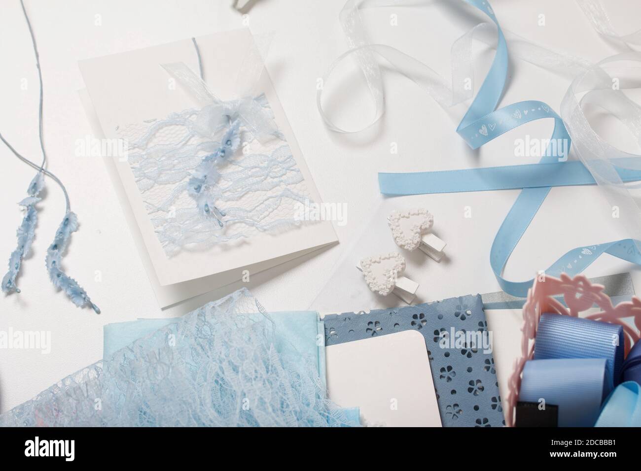 Making greeting cards. Handicraft accessories on the white surface of ...