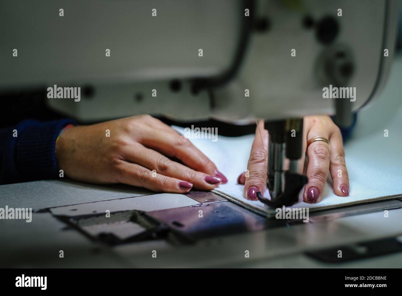 Operating a sewing machine hi-res stock photography and images - Alamy