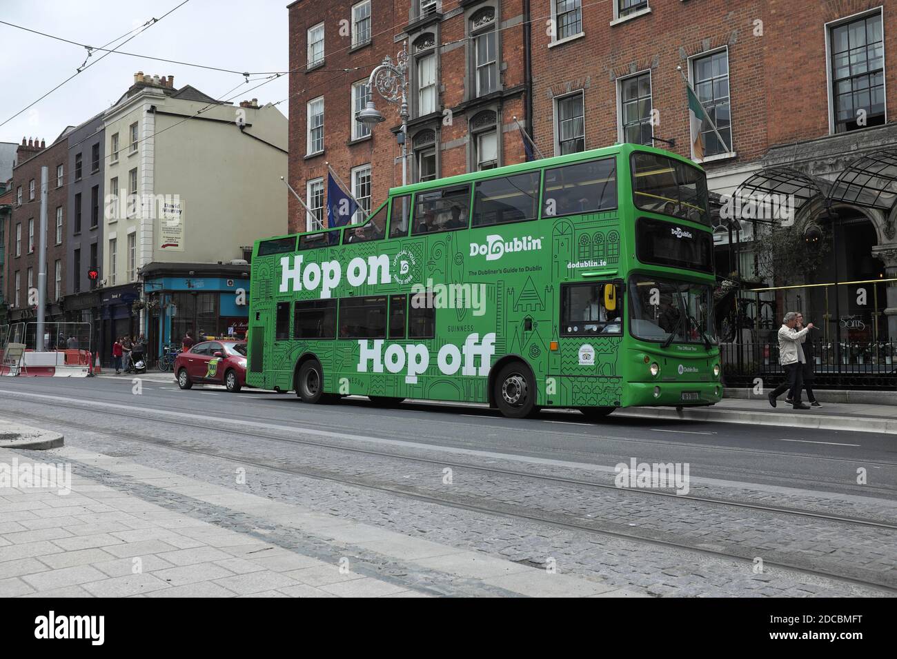 Hop On Hop Off Tourist Bus In Dublin Ireland Stock Photo - Alamy