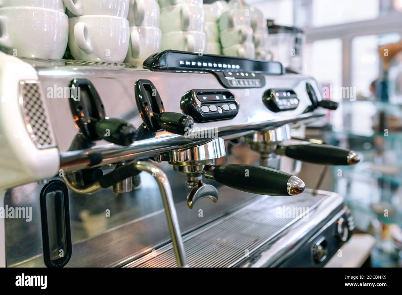 Professional coffee maker in a coffee shop Stock Photo - Alamy