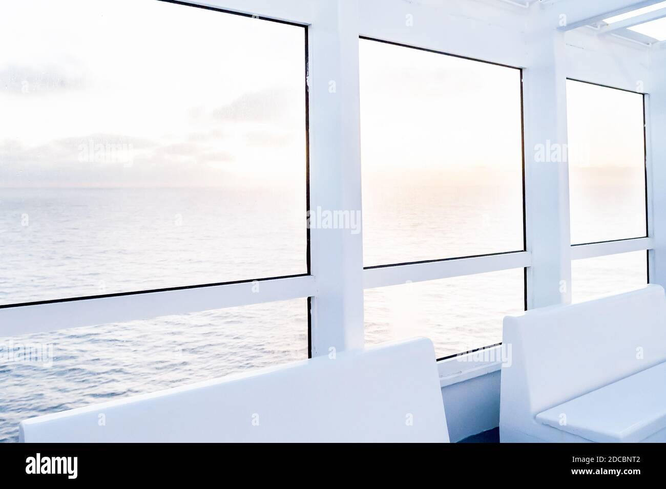 Windows and seating on a ferry crossing between Corsica and Nice ...