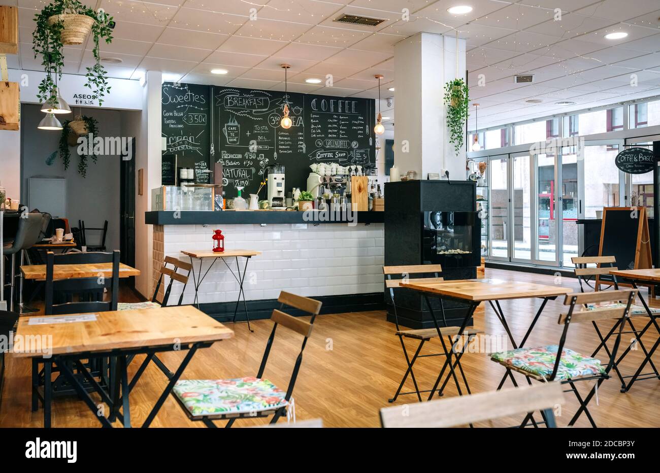 Empty cafe interior with chairs and tables Stock Photo - Alamy