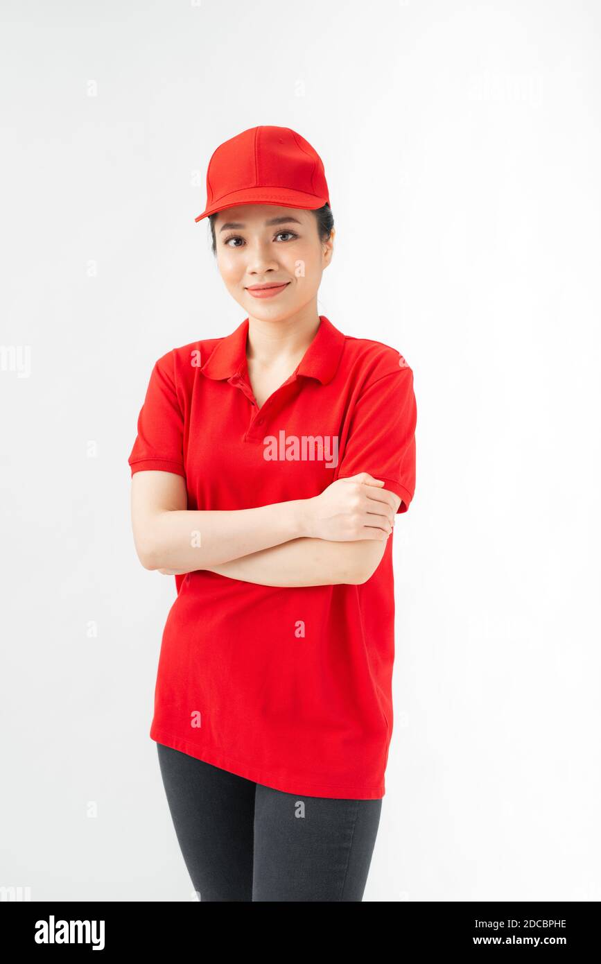 Delivery woman in red uniform isolated on white background Stock Photo ...