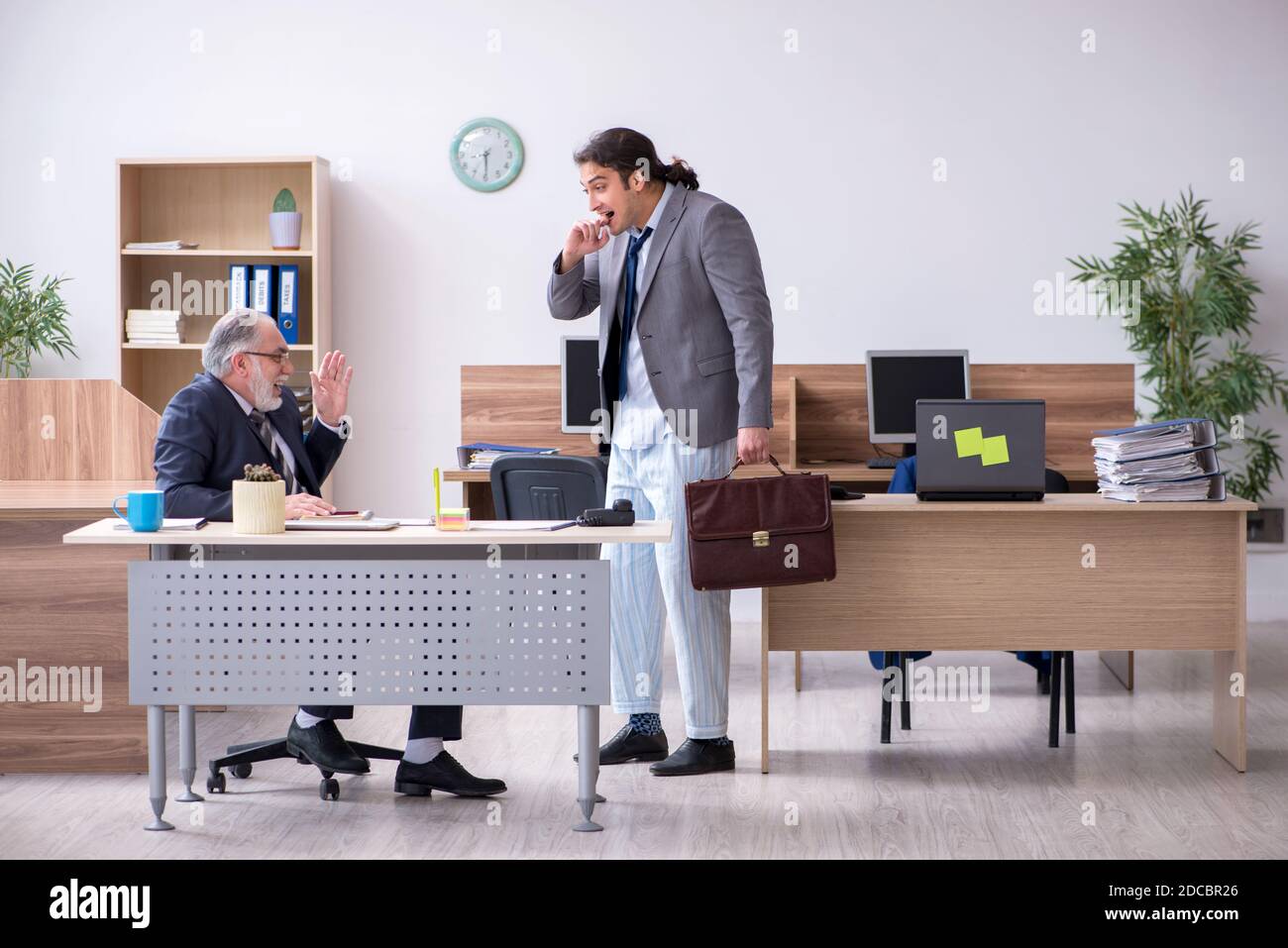 Young employee being late for work Stock Photo - Alamy