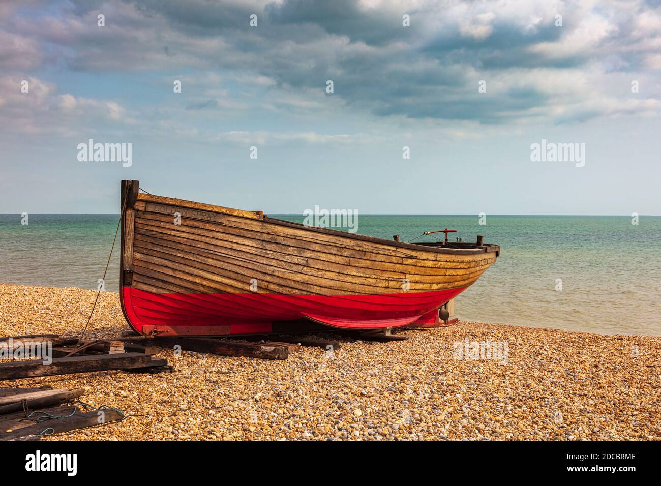 The Golden Spray traditional wooden clinker built fishing boat beached ...