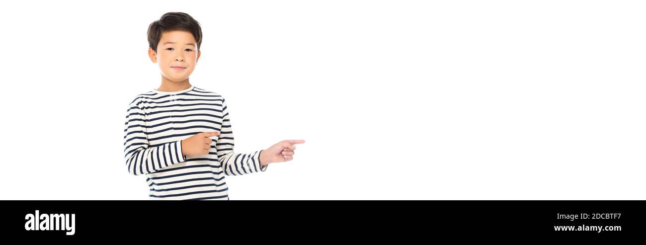 Asian child pointing with fingers away isolated on white, banner Stock ...
