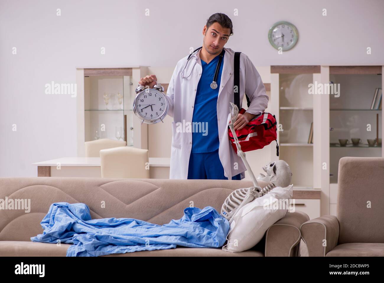 Male paramedic visiting skeleton patient Stock Photo - Alamy